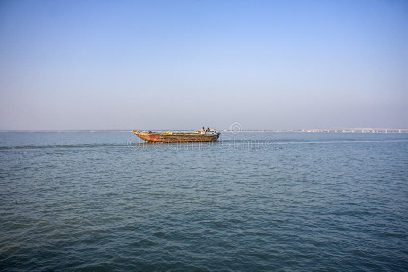 Landscape Photo of River and Green Land with a Cargo Ship Stock Image ...