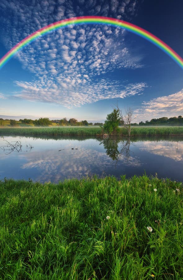 Landscape with a Rainbow on the River in Spring Stock Photo - Image of ...