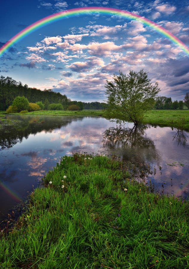 Landscape with a Rainbow on the River in Spring. Colorful Morning Stock ...