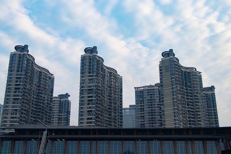 Landscape of Rectangular High-rise Building. Blue Sky with White Cloud ...