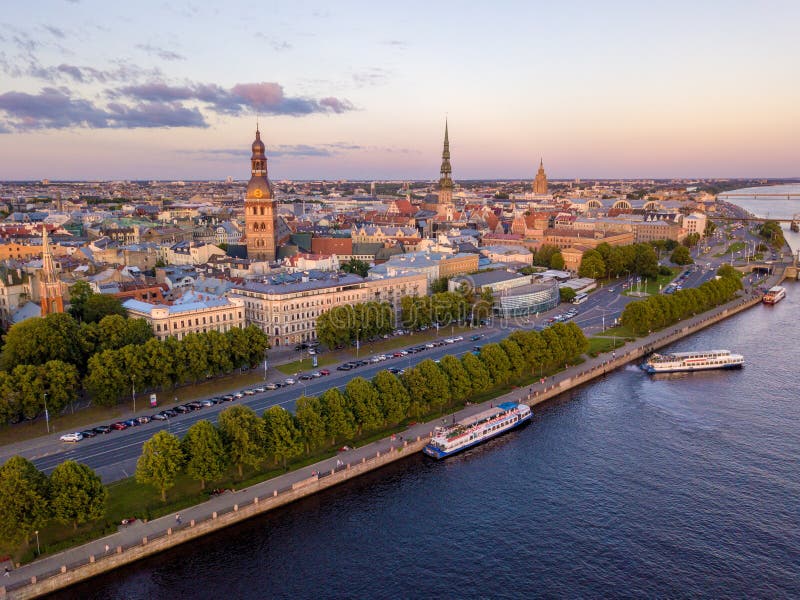 Landscape of Riga Surrounded by a River and Greenery in the Evening in ...