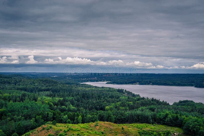 Landscape with a River in Denmark Stock Photo - Image of cloudy, dark ...