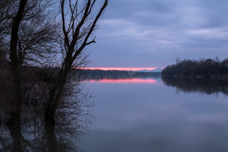 Landscape of River, Reflection of Distant Mountain in Calm Water and ...