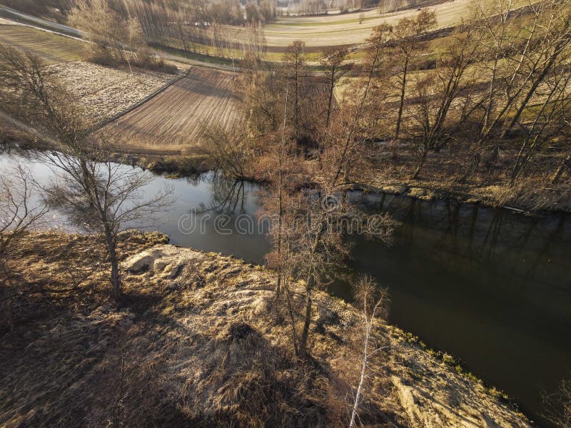 Landscape with a River and the Setting Sun. Stock Photo - Image of ...