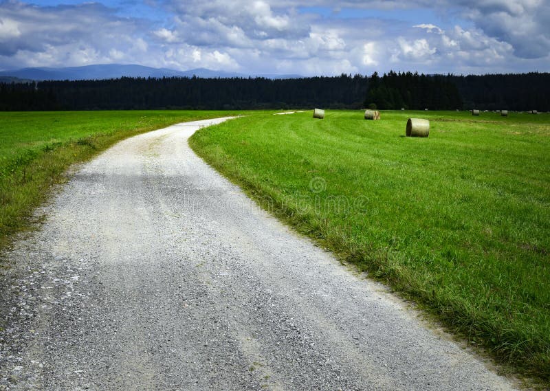 Landscape of Rock Bend on Country Road Stock Photo - Image of clouds ...