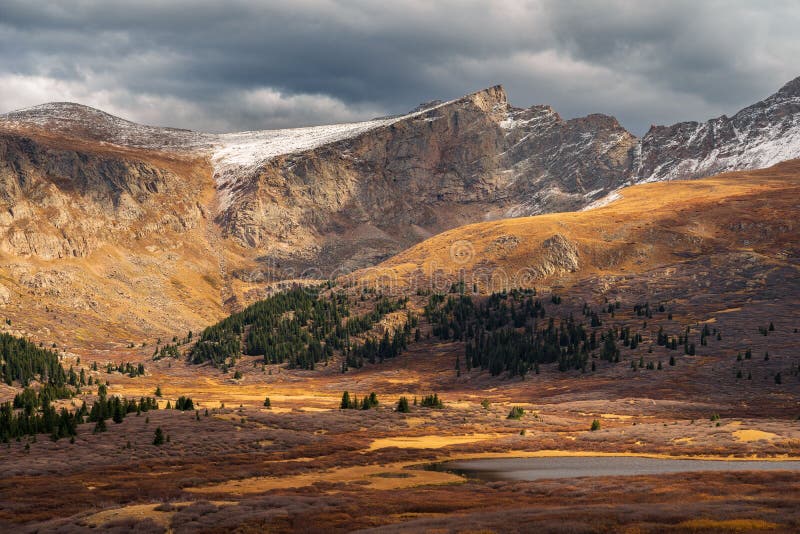 Landscape of Rock Formations with Trees in the Foreground on a Cloudy ...