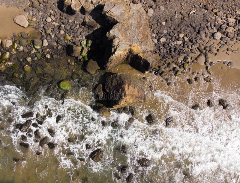 Landscape with Rocks, the Ocean and Many Stones. Top View, Texture ...