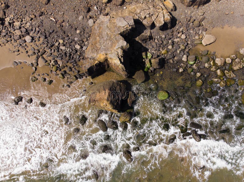 Landscape with Rocks, the Ocean and Many Stones. Top View, Texture ...