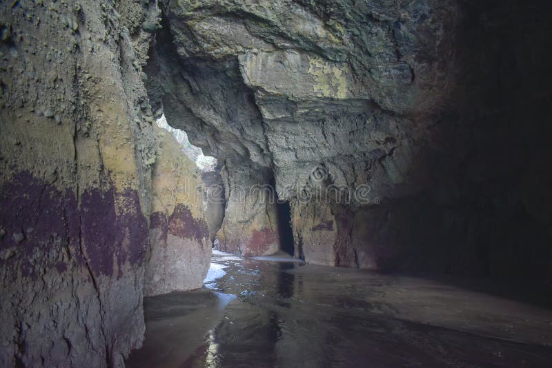 Landscape Shot of a Wet Cave with Various Patterns on the Walls Stock ...