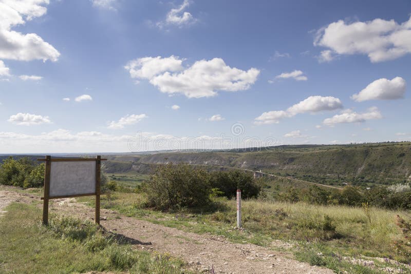 Landscape with signboard stock photo. Image of cloud - 183052434