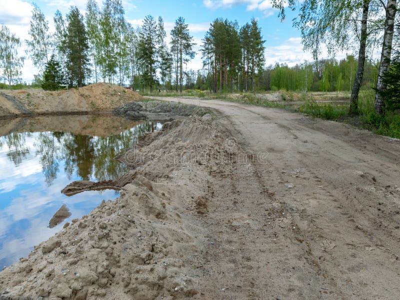 A Simple Dirt Road, Clay New and Old Grass, Spring Landscape Stock ...