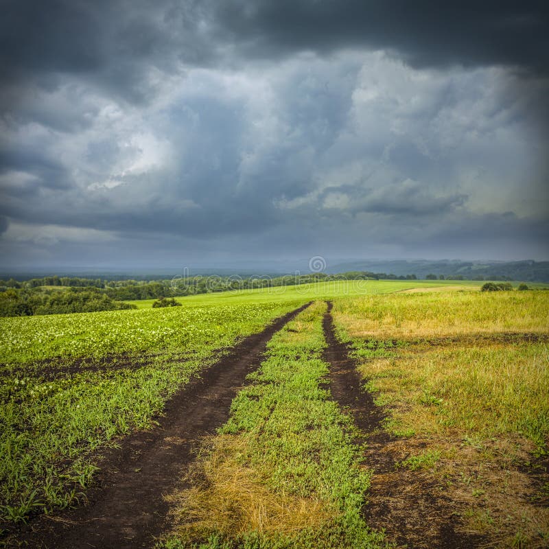 Dirt Road through the Prairie in Storm Stock Image - Image of stormy ...