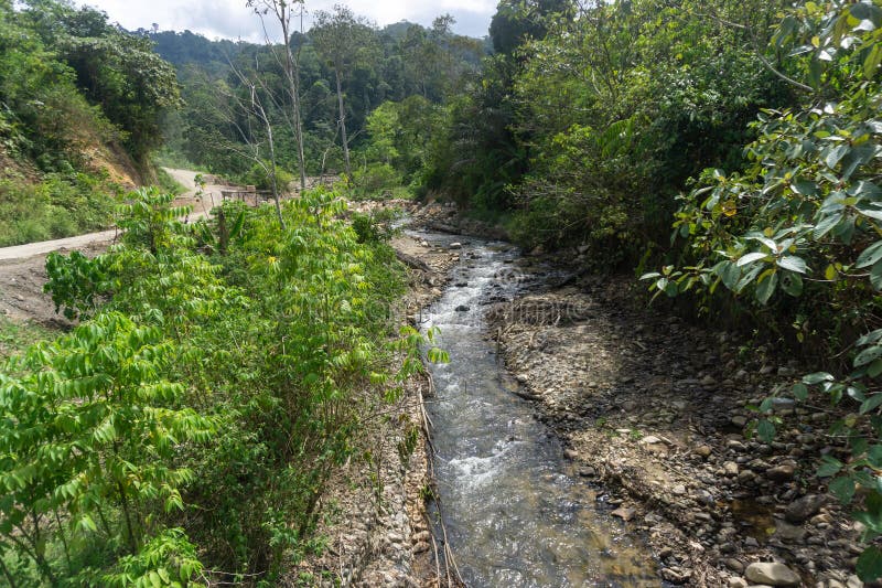 Landscape of Small River and Village Road with Beautiful Mountain ...