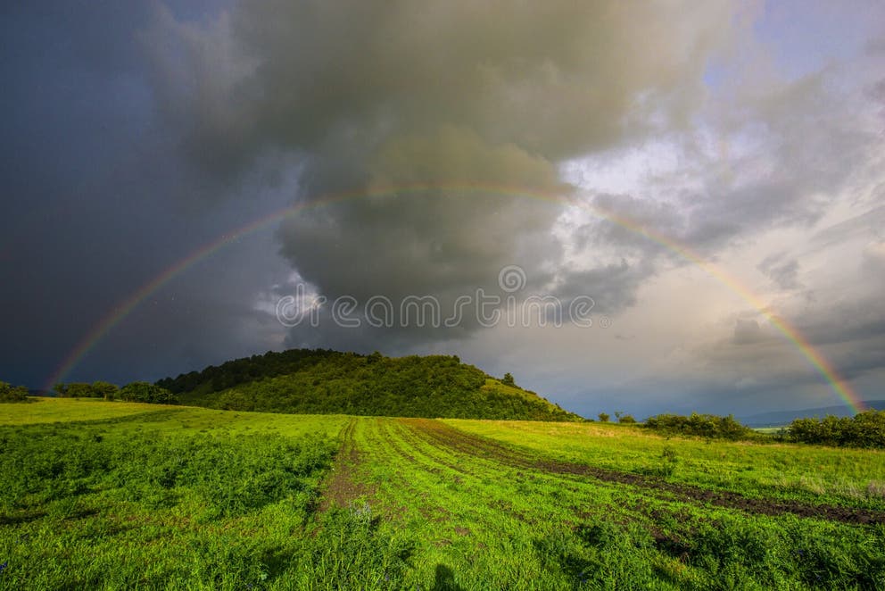 Landscape at the Springtime and Beautiful Rainbow Stock Photo - Image ...