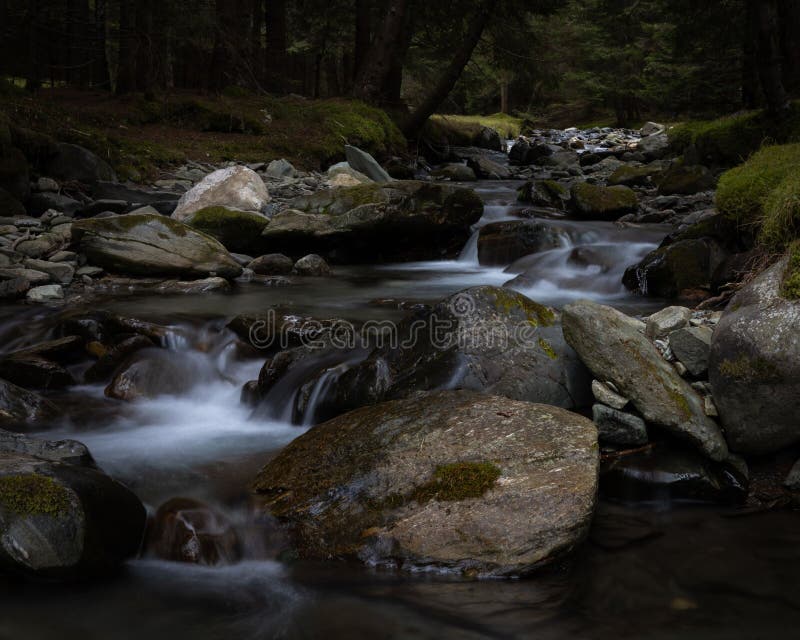 Landscape of a Stream with Long Exposure in a Forest Covered in Rocks ...