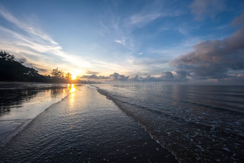 Landscape of Sunrise Beach with Sun Rays and Cloud Stock Photo - Image ...