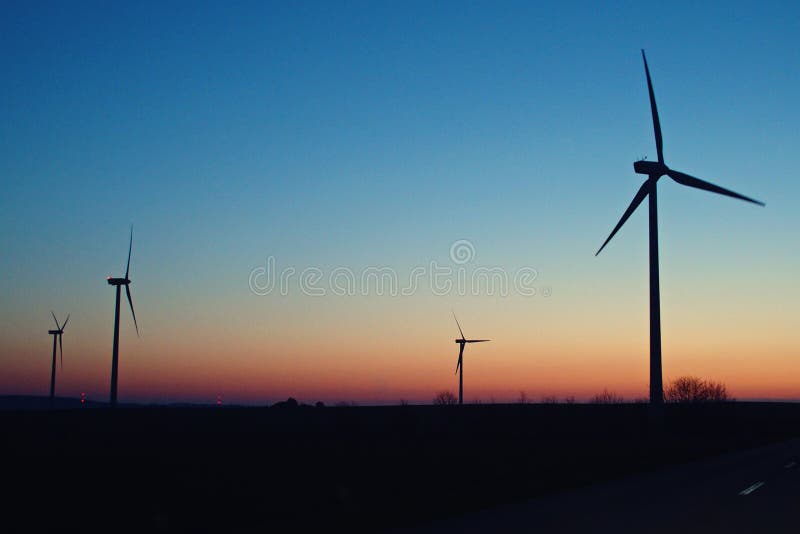 Landscape with Sunset and Wind Farm Windmills after Dark Stock Image ...