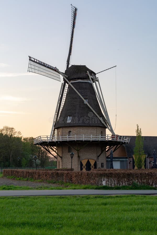 Landscape with Traditional Dutch Grain Wind Mill and Blue Sky on Sunset ...