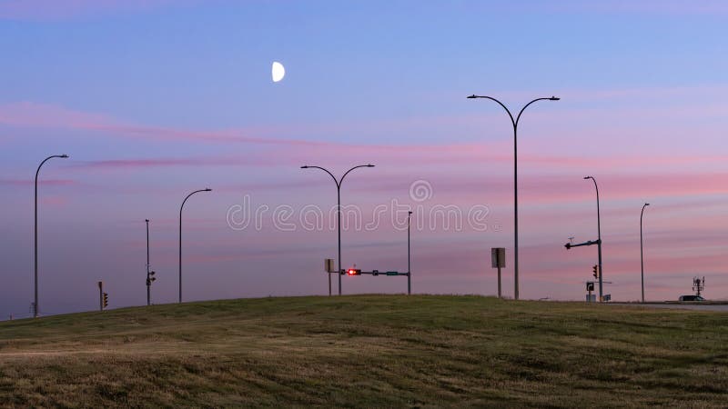 Landscape with Traffic Lights,lighting Poles and Sunset Sky and Moon ...