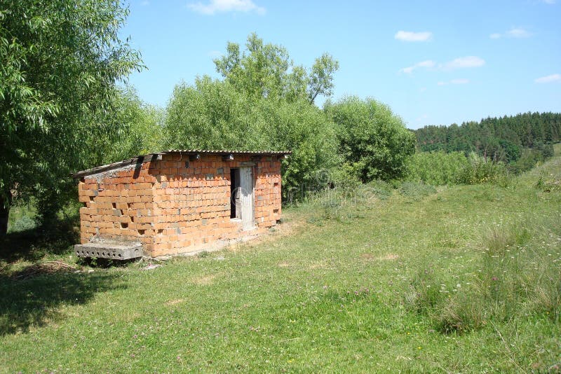 Landscape with Trees and Debris Small Brick Building Editorial Image ...