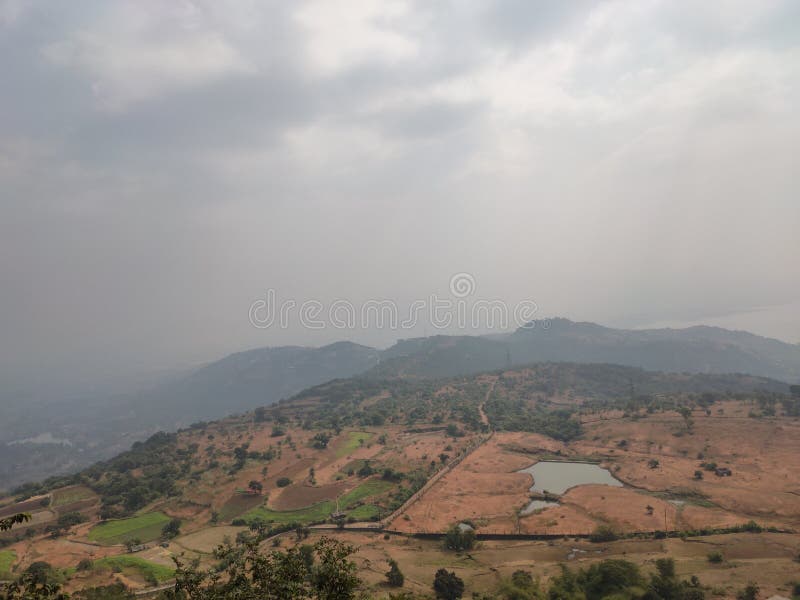Landscape Undera Cloudy Sky, a View from Lohagad Fort Stock Image ...