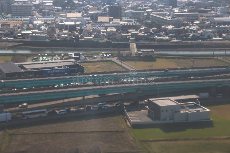 Landscape View with Buildings, Roadways, and Fields from Elevated ...