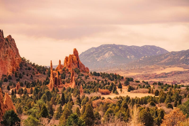 Landscape View of Desert with Hills, Red Cliffs and Trees Stock Photo ...