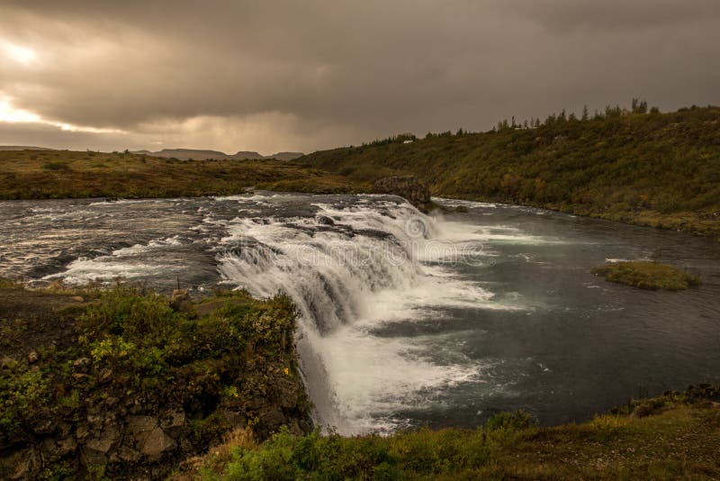Landscape View of the Faxi Waterfall Under the Cloudy Sky in Iceland ...