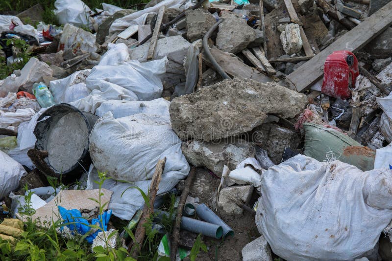 Landscape View on a Green Forest and Grass with Huge Garbage Dump ...