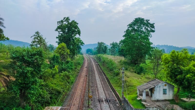 Landscape View of a Railway Track from a Bridge in Middle of Forest ...