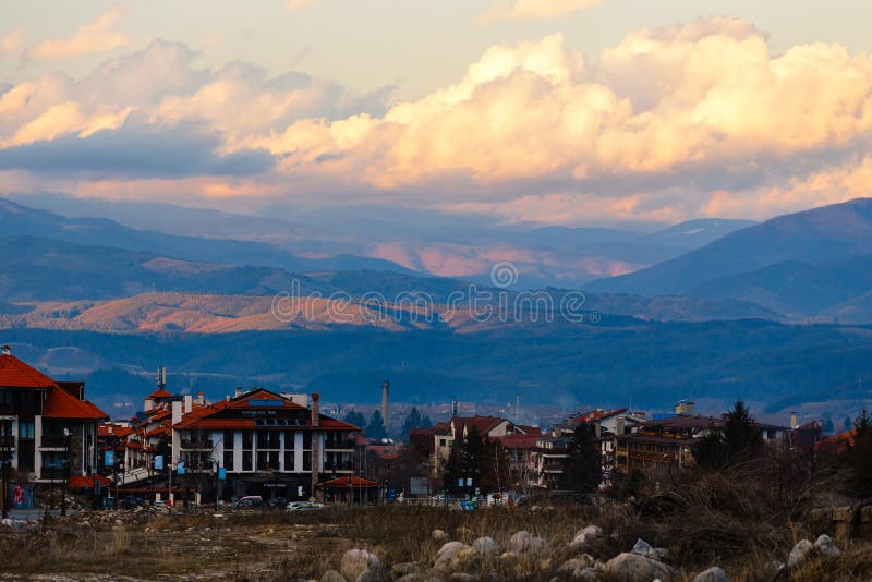 Landscape with View on Small Town with Mountains and Clouds Stock Photo ...