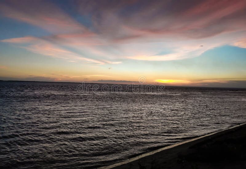 A Landscape View of Sunset at a River Side in Bangladesh. Stock Image ...
