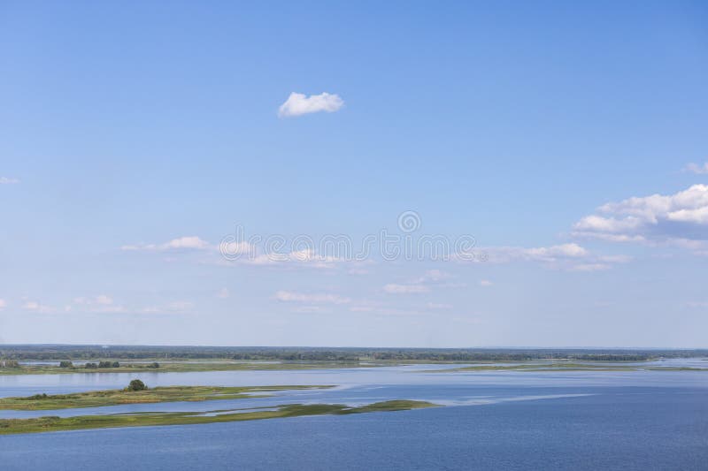 View of Water with Islands and Sky with White Clouds Stock Photo ...