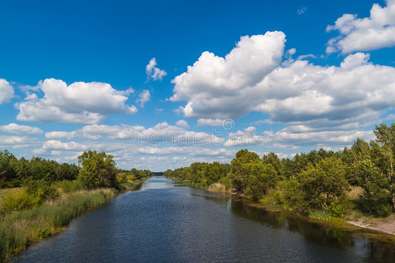 Landscape with White Clouds Above the River. Stock Image - Image of ...