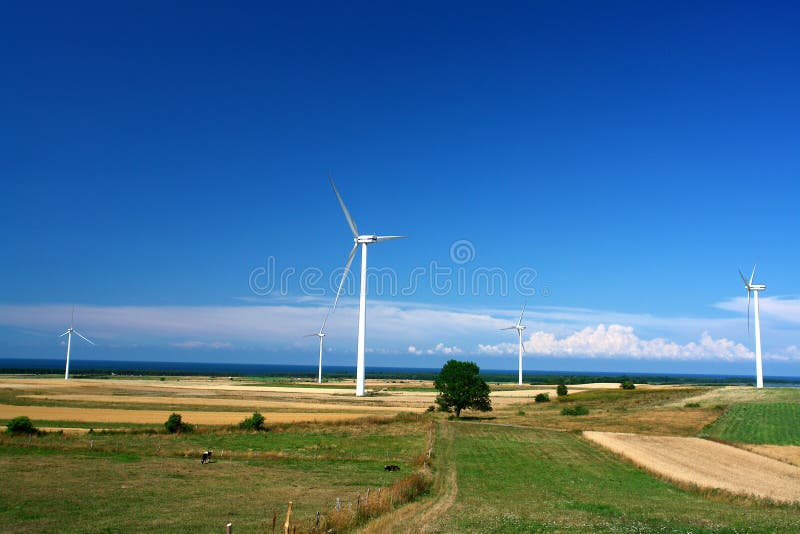 Wind Turbines stock image. Image of wind, purple, sunset - 2401021