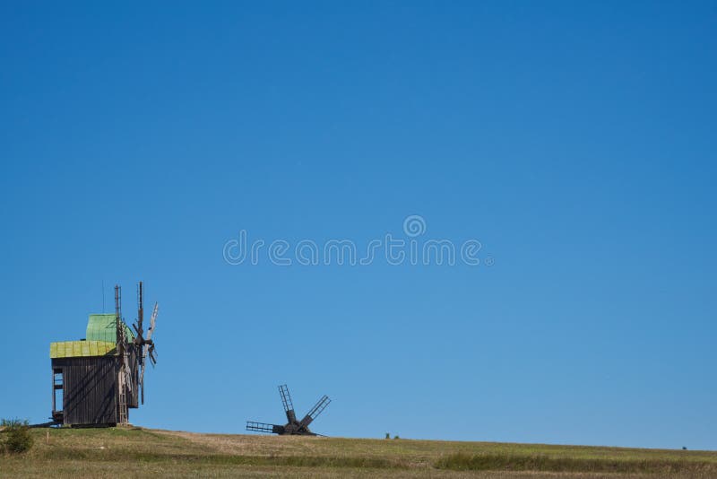 Landscape with Windmills on the Background of Blue Sky. Background ...