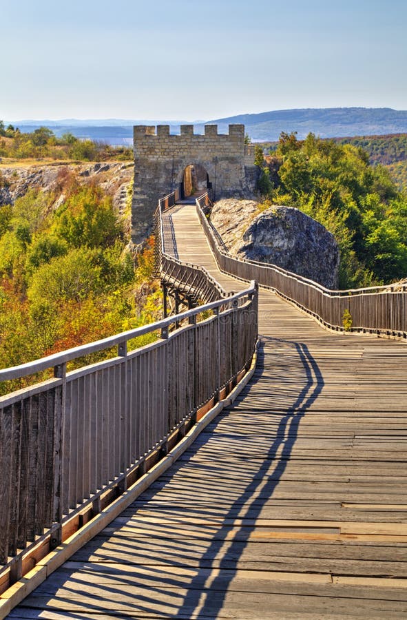 Landscape with Wooden Bridge and Stone Gate Stock Image - Image of ...