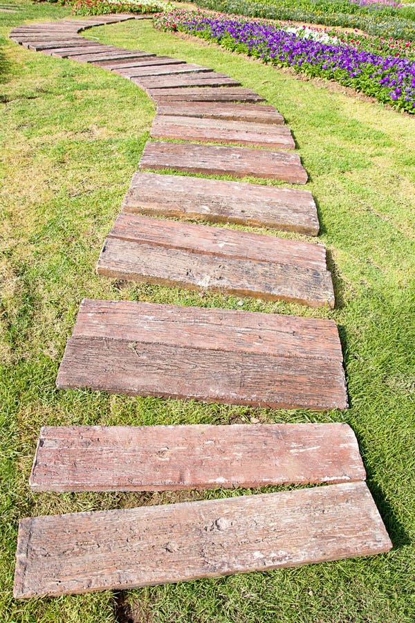 Designer Wood Garden Pavement on Grass Lawn Stock Image - Image of ...