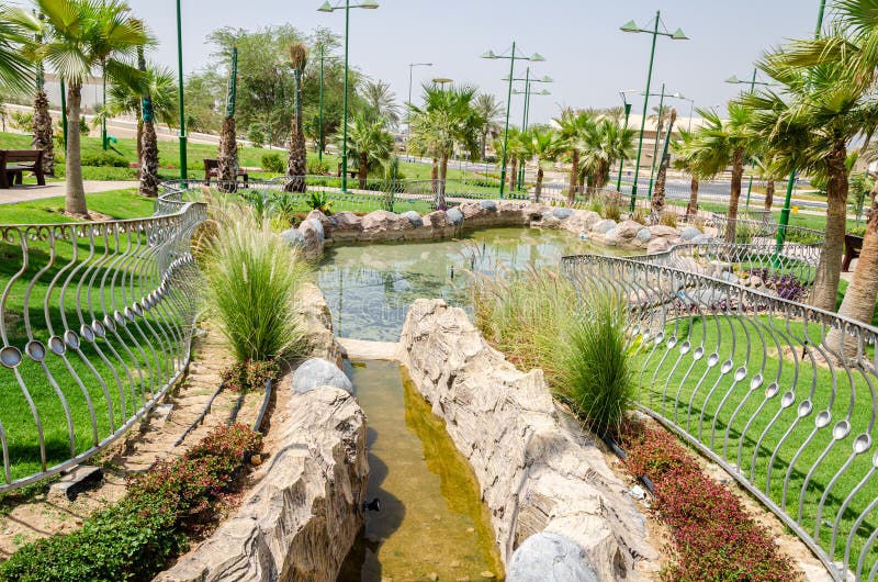 Landscaping in a park stock image. Image of gardening - 332044249