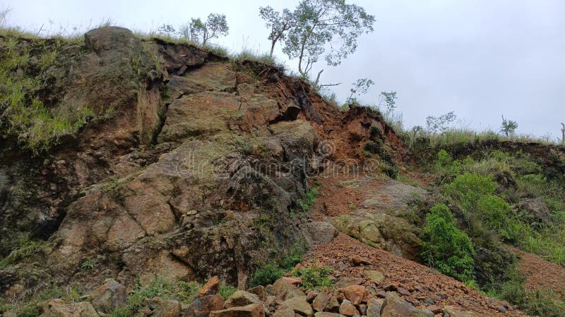 Landslide on a Hill with Natural Background. Rocks Scattered on the ...
