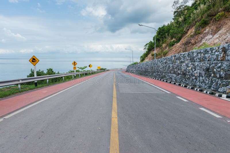 Lane of Asphalt Road with the Ocean Stock Photo - Image of route ...