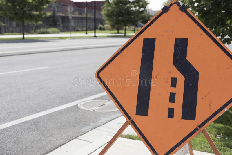 Lane Ends Merge Sign stock photo. Image of information - 98208574