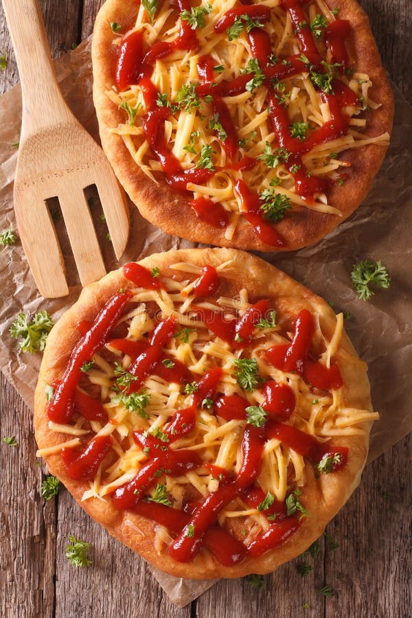 Langos with Cheese and Ketchup Close-up. Vertical Top View Stock Image ...