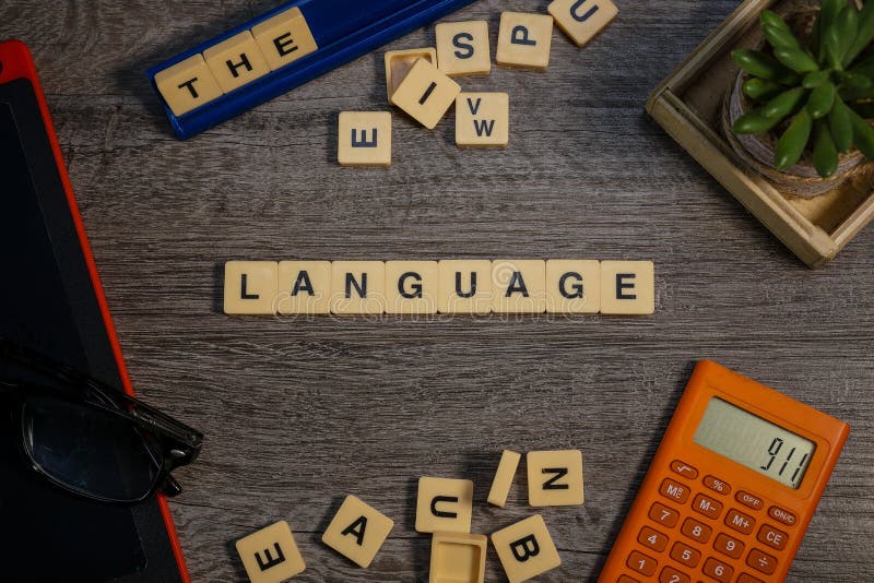 Language Wording on a Grey Wooden Background Stock Photo - Image of ...