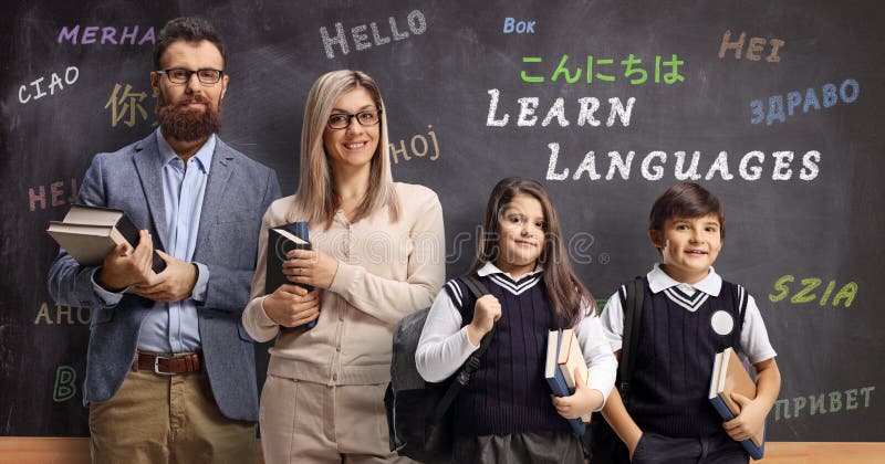 Language Teachers and Pupils Posing in Front of a Blackboard with Text ...
