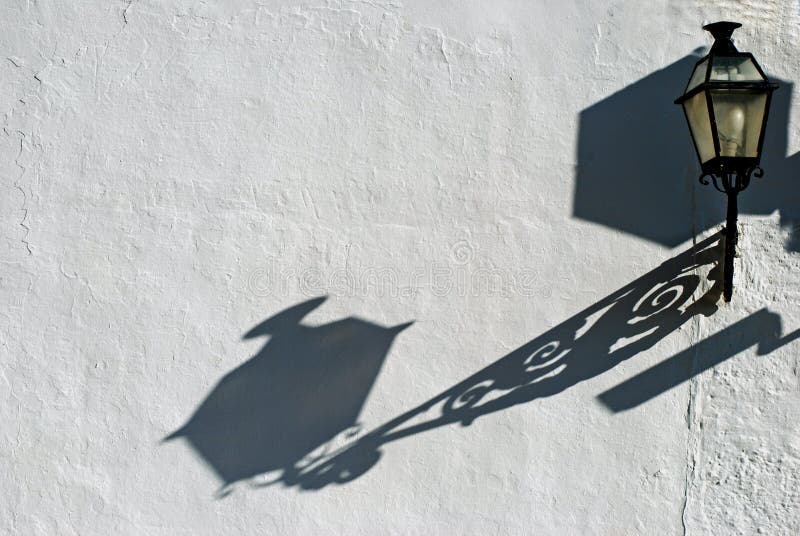 Lantern Casting Shadow on Wall Stock Image - Image of metal, details ...