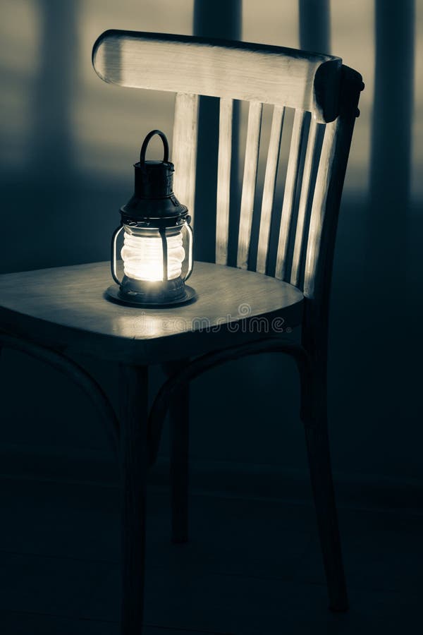Lantern on a chair stock image. Image of darkness, design - 183047341