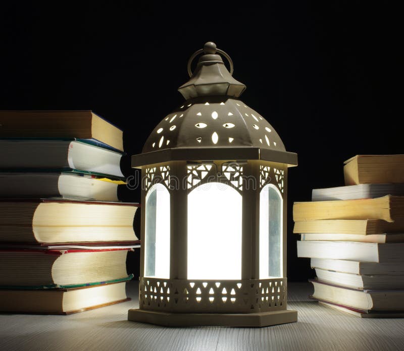 Lantern between many books stock image. Image of fairy - 44885377