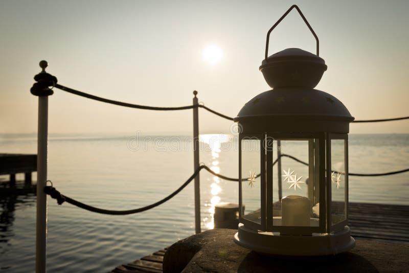 Lantern on the Sea at Sunset Stock Image - Image of design, ocean: 36811871