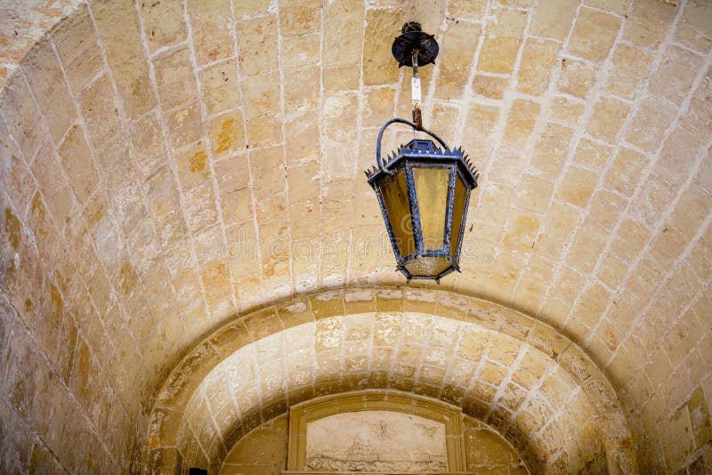 Lantern under the arch stock image. Image of retro, stone - 74096685